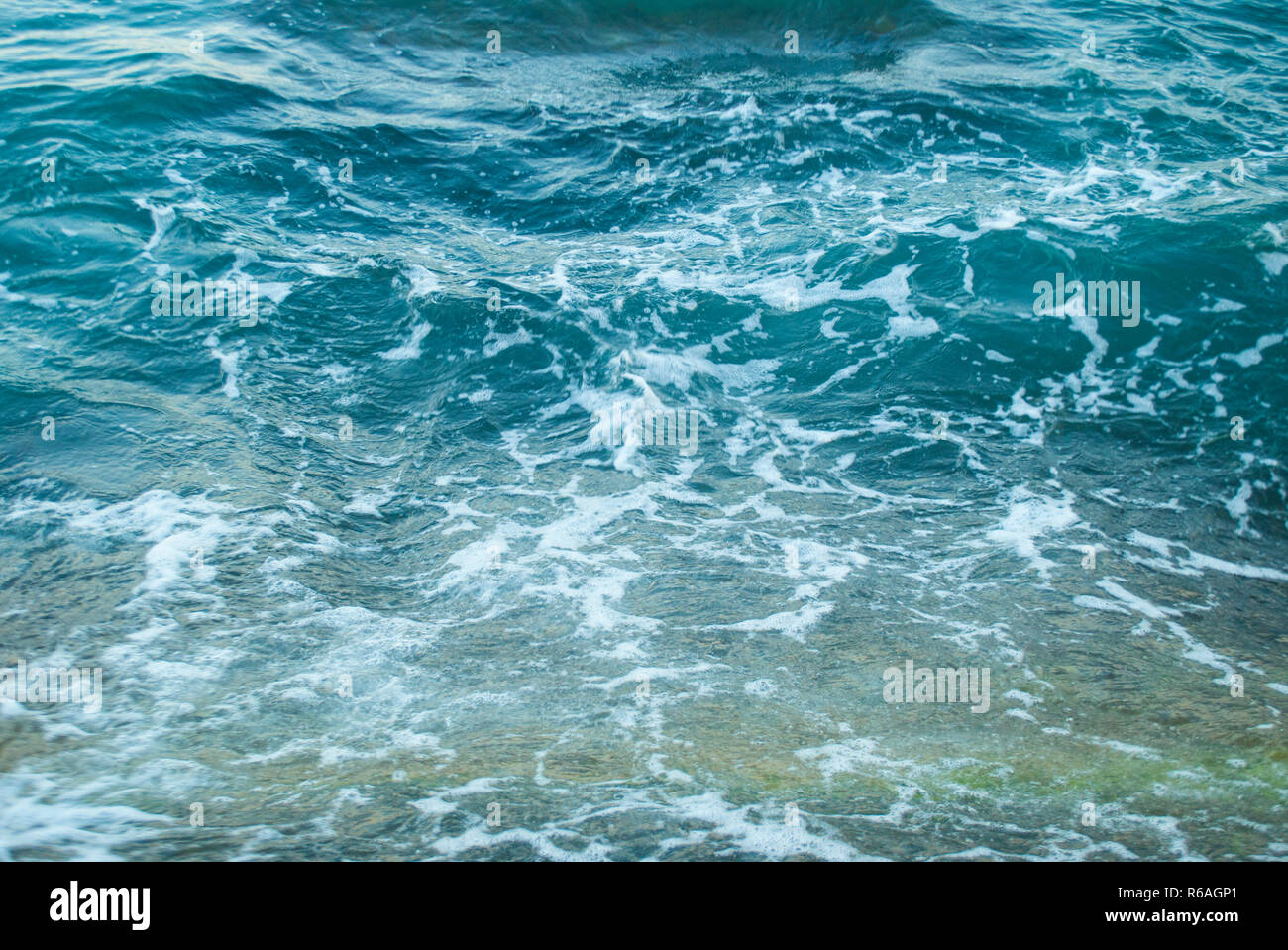 Abstract blue background of frothy sea surface Stock Photo - Alamy