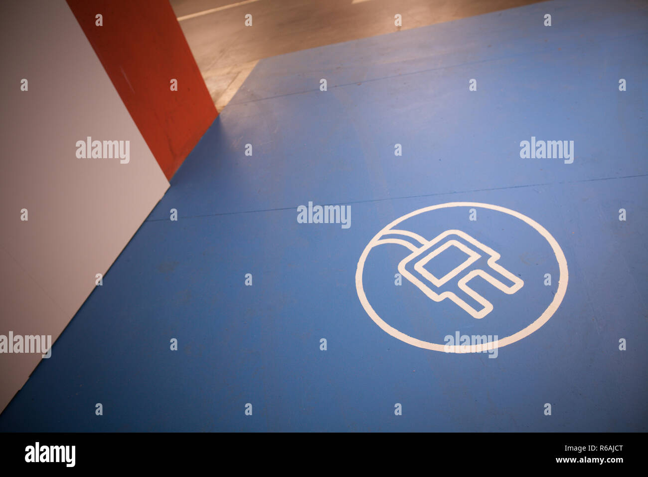 Electric car charging place Stock Photo - Alamy