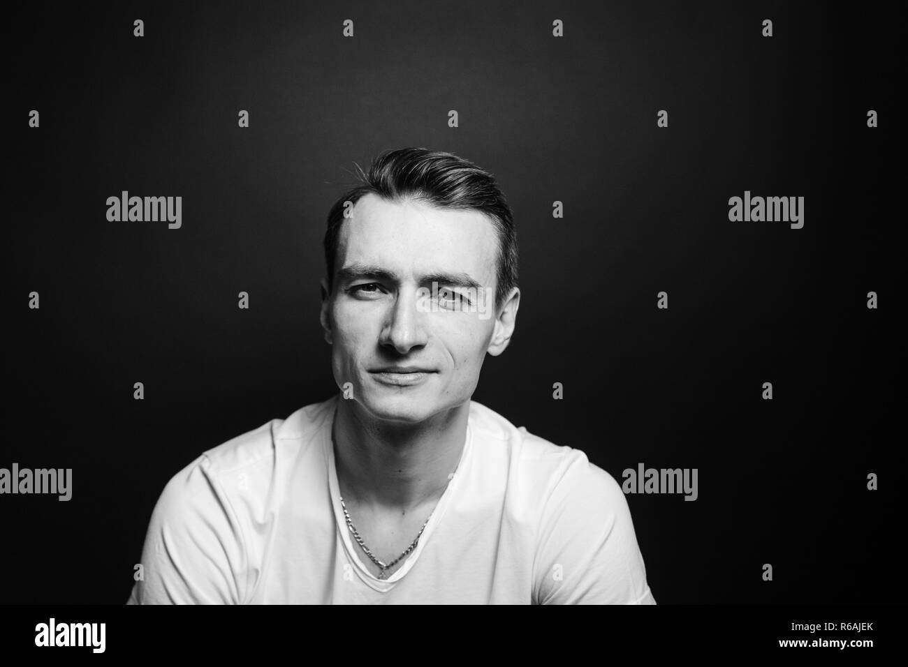 Smiling man in white hard Black and White Stock Photos & Images - Alamy