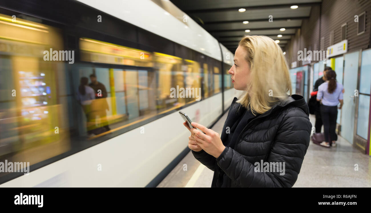 Waiting at metro hi-res stock photography and images - Alamy