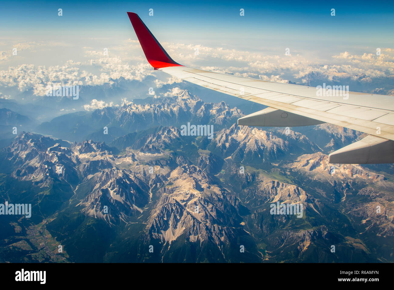 View from the airplane window on the Alps Stock Photo - Alamy