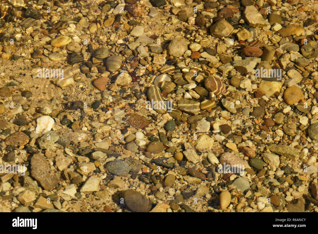 Pebbles Under Water Stock Photo - Alamy