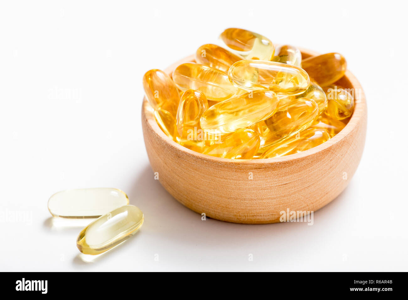 Fish oil capsules with omega 3 and vitamin D. healthy diet concept ...