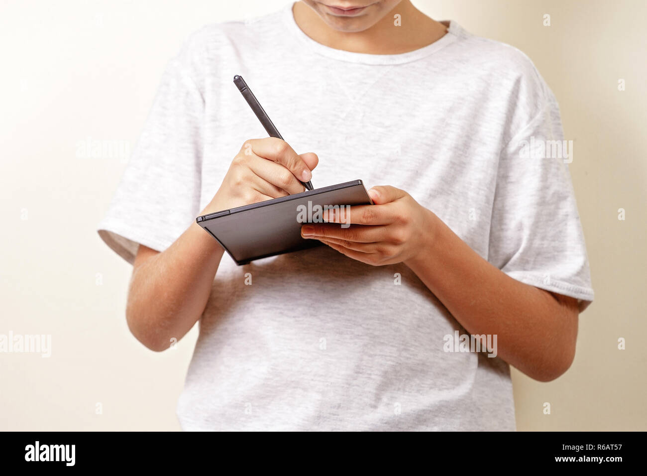 Black kid school tablet hi-res stock photography and images - Alamy