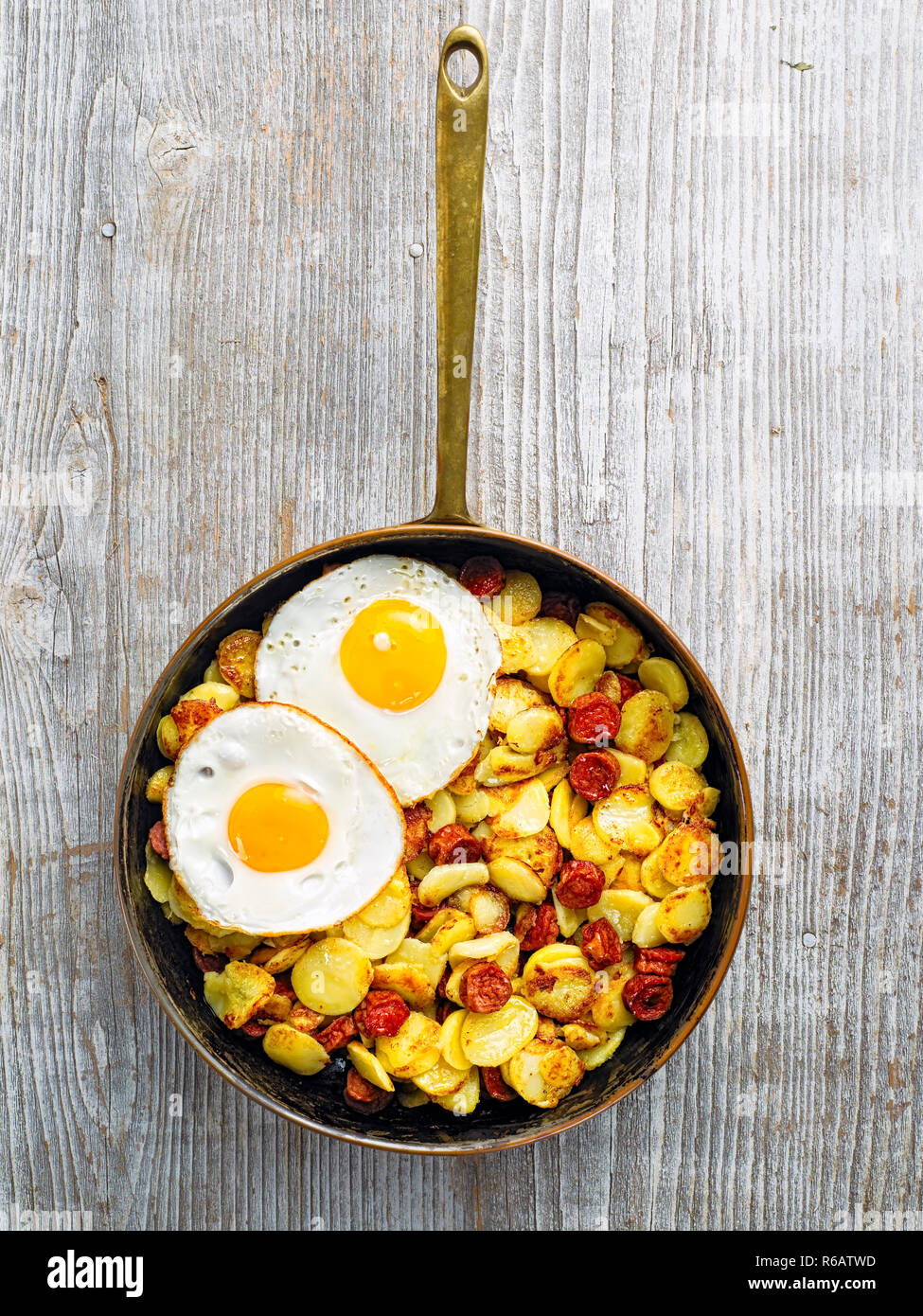 pan of rustic sausage potato hash Stock Photo - Alamy
