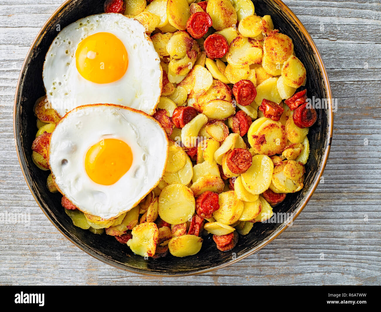 pan of rustic sausage potato hash Stock Photo - Alamy