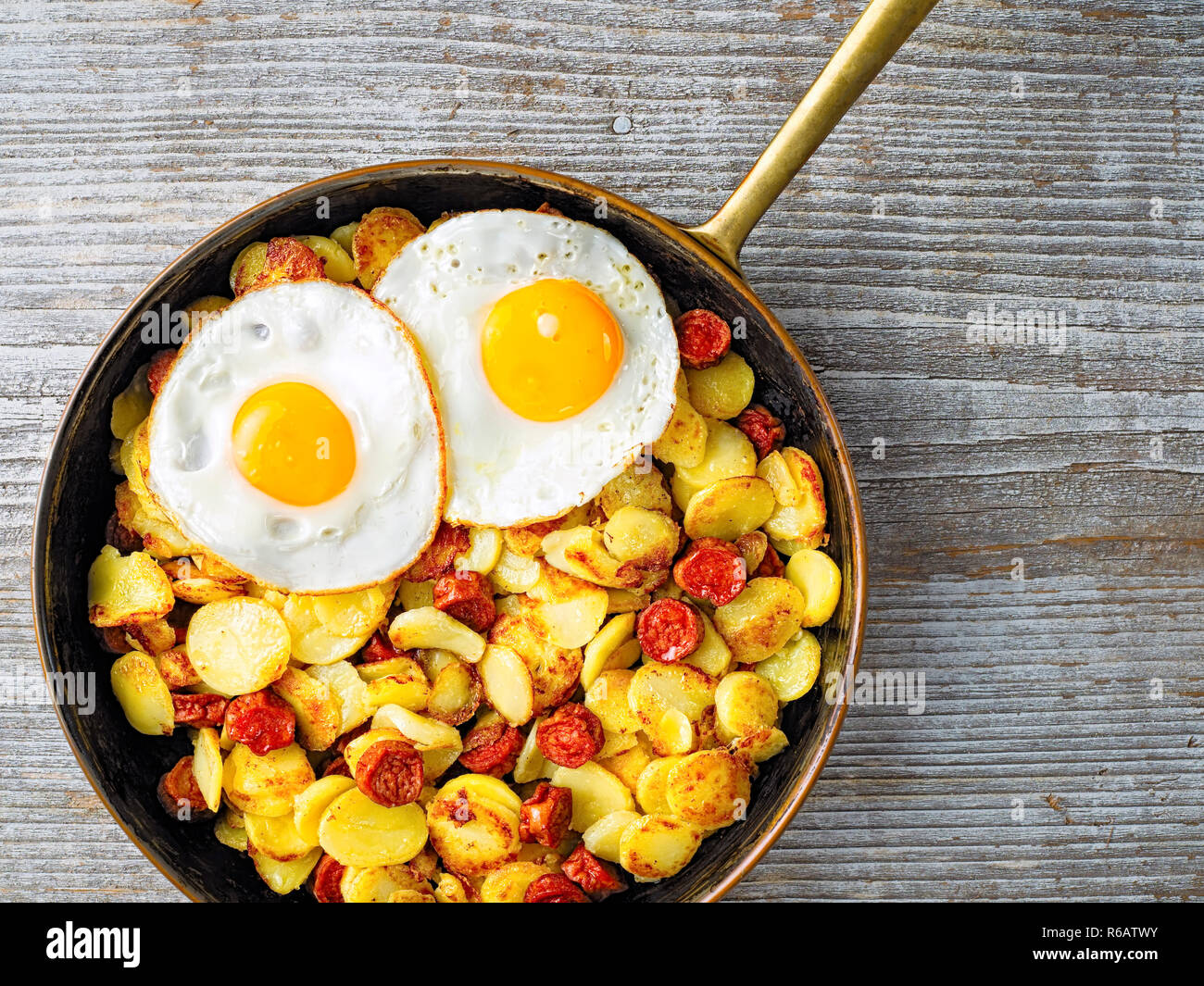 pan of rustic sausage potato hash Stock Photo - Alamy