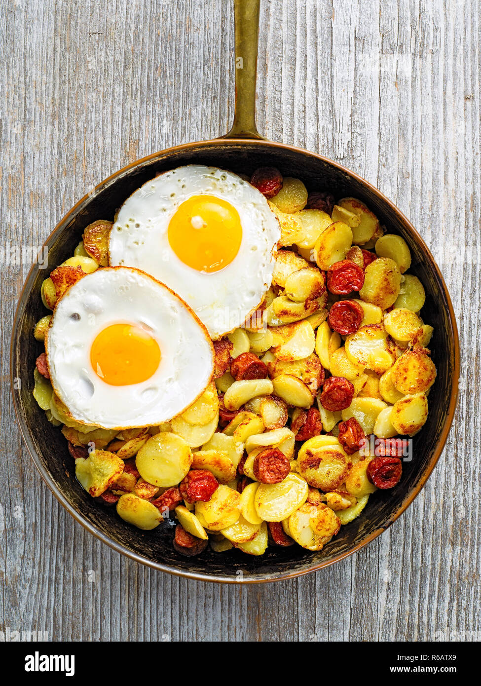 pan of rustic sausage potato hash Stock Photo - Alamy