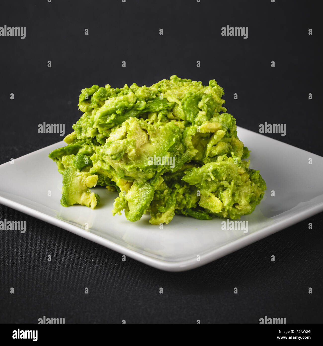 Mashed Avocado Ready for Guacamole Stock Photo - Alamy