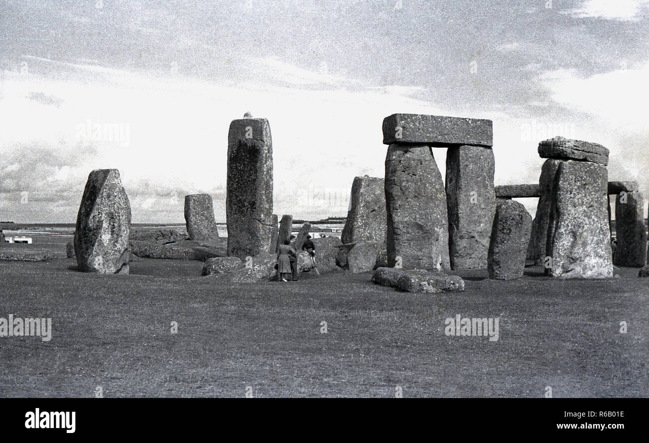 1940s, historical, a family visiting Stonehenge, an ancient prehistoric ...