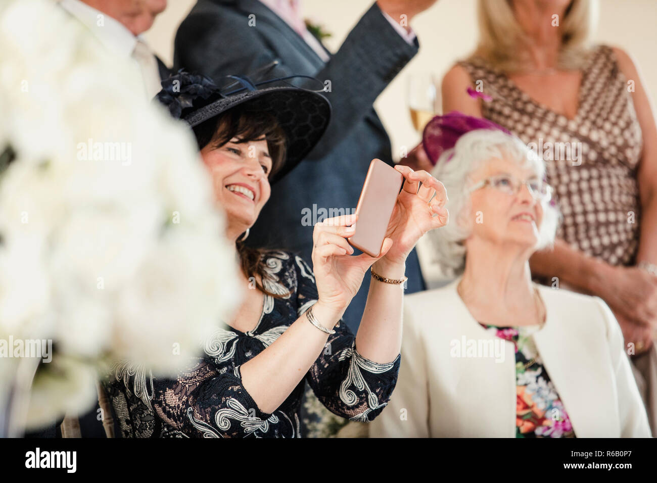 Taking Photos at Wedding Reception Stock Photo - Alamy