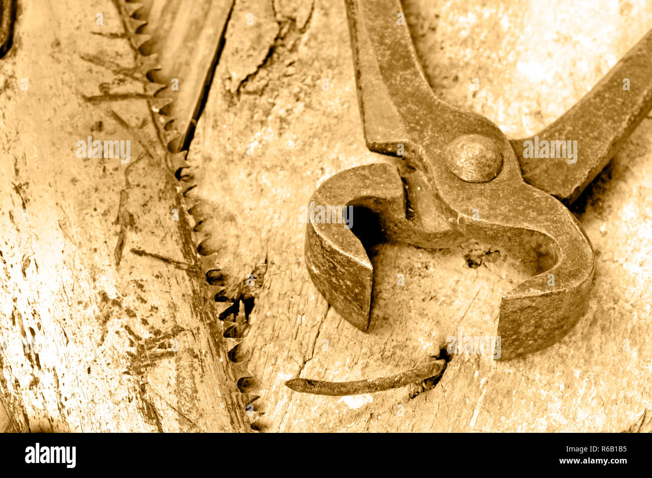 Old Rusty Pliers With Nail Stock Photo - Alamy