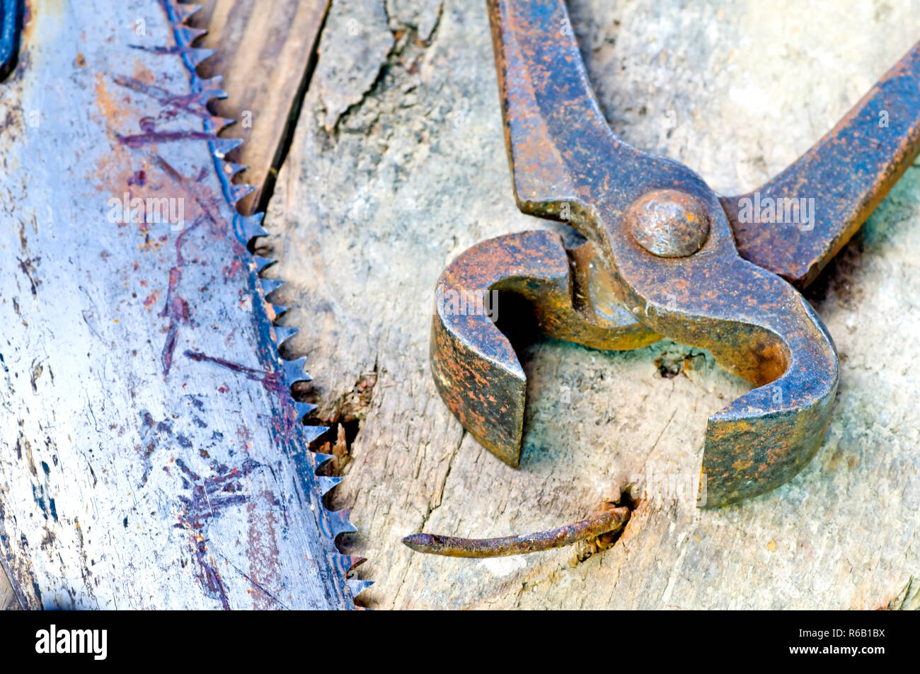 Old Rusty Pliers With Nail Stock Photo - Alamy