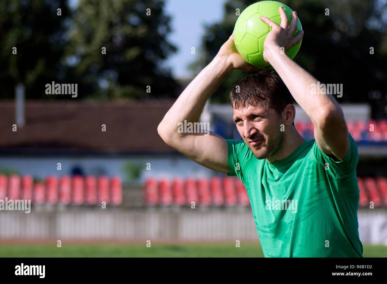 soccer player throwing ball Stock Photo - Alamy