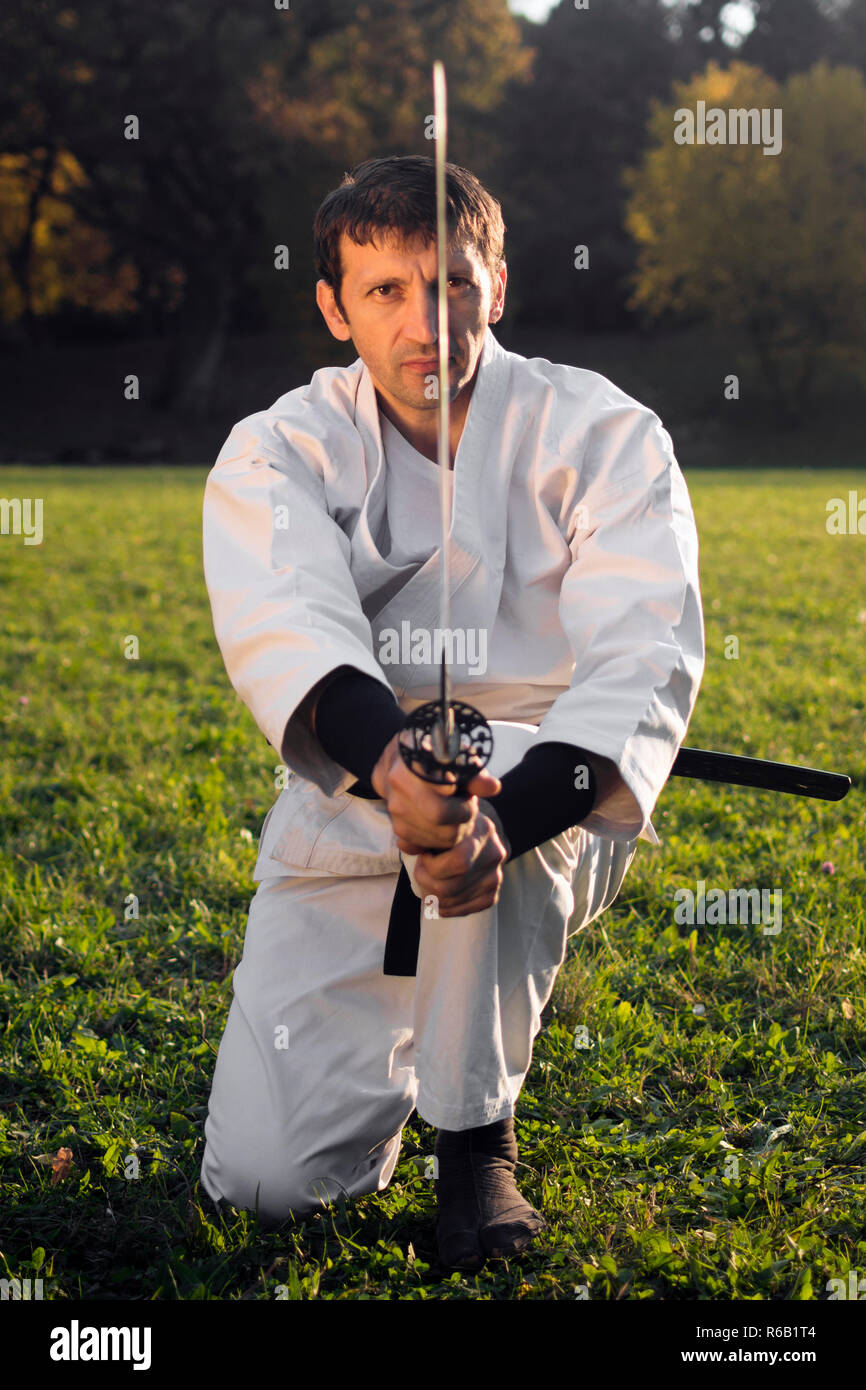 white ninja with sword Stock Photo - Alamy