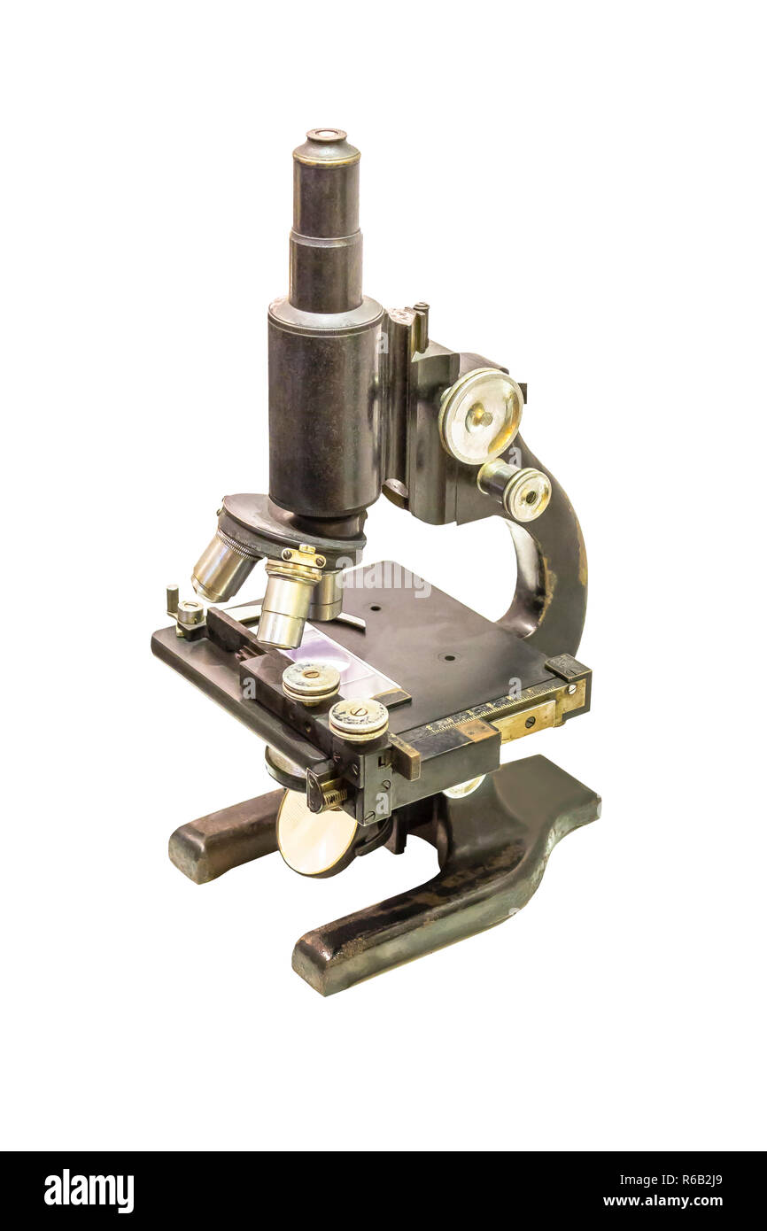 Antique microscope isolated Stock Photo - Alamy