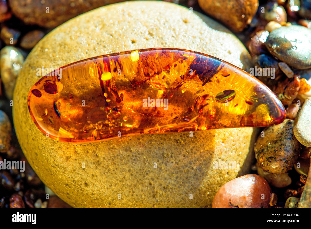 Amber On A Beach Of The Baltic Sea Stock Photo - Alamy