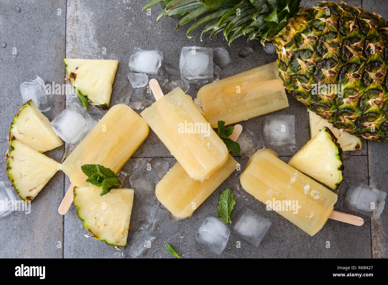 Frozen Pineapple Popsicles Stock Photo - Alamy