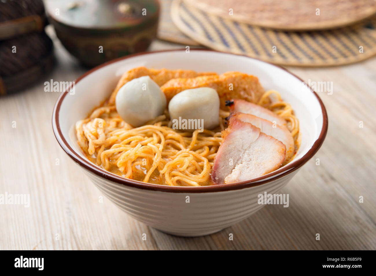 Chinese noodles fish curry hi-res stock photography and images - Alamy