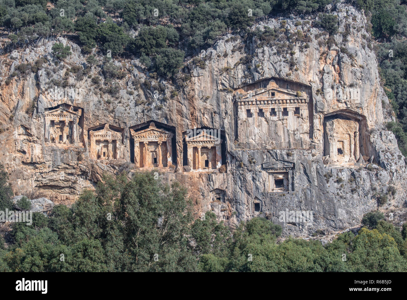 Boats view at slope of Lycians rock tombs in Dalyan Town Stock Photo ...