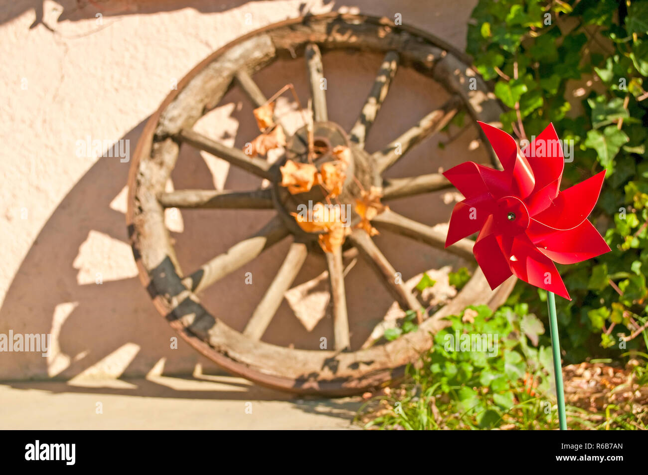 Wind Wheel With Cart Wheel Stock Photo - Alamy