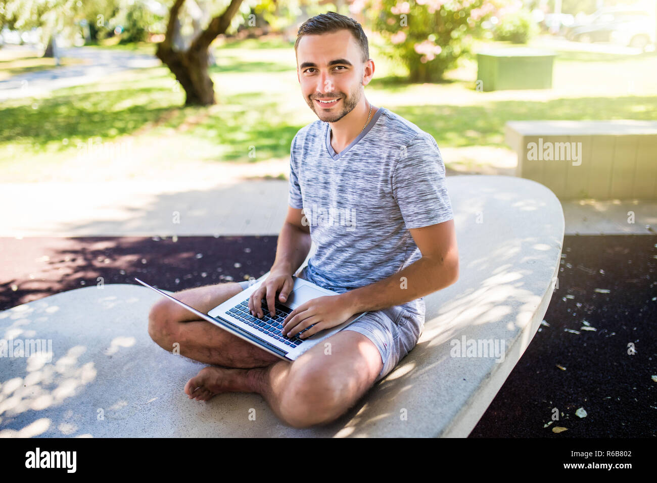 Entrepreneur working on idea on his laptop Stock Photo - Alamy
