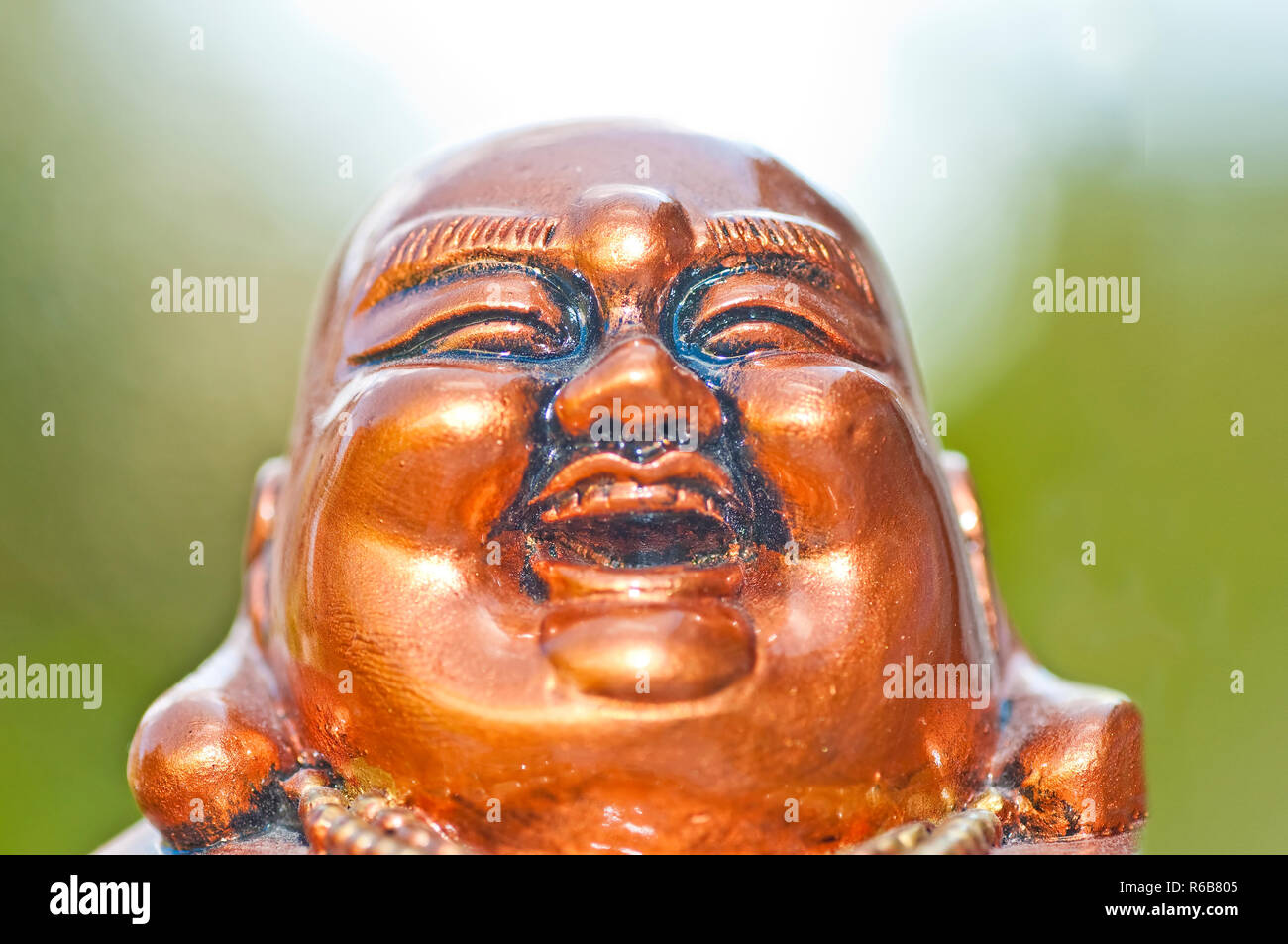 Funny golden buddha hi-res stock photography and images - Alamy