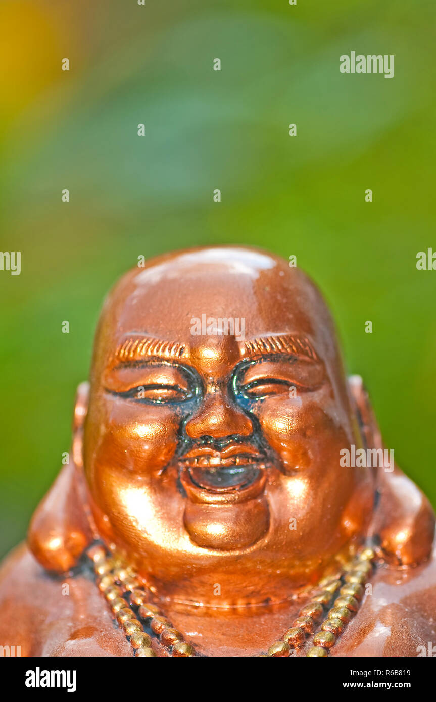 Funny golden buddha hi-res stock photography and images - Alamy