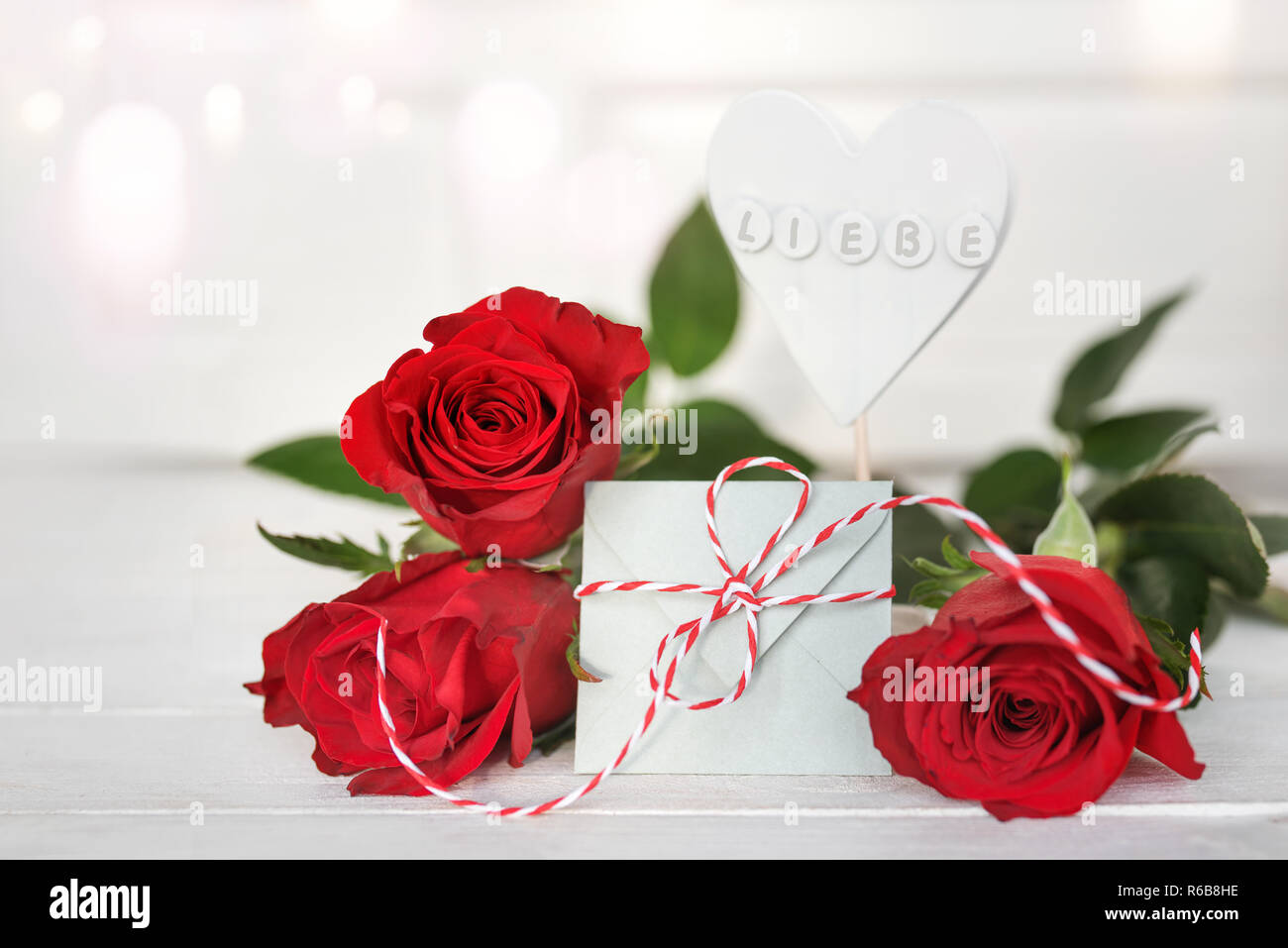 red roses with a message of love Stock Photo - Alamy