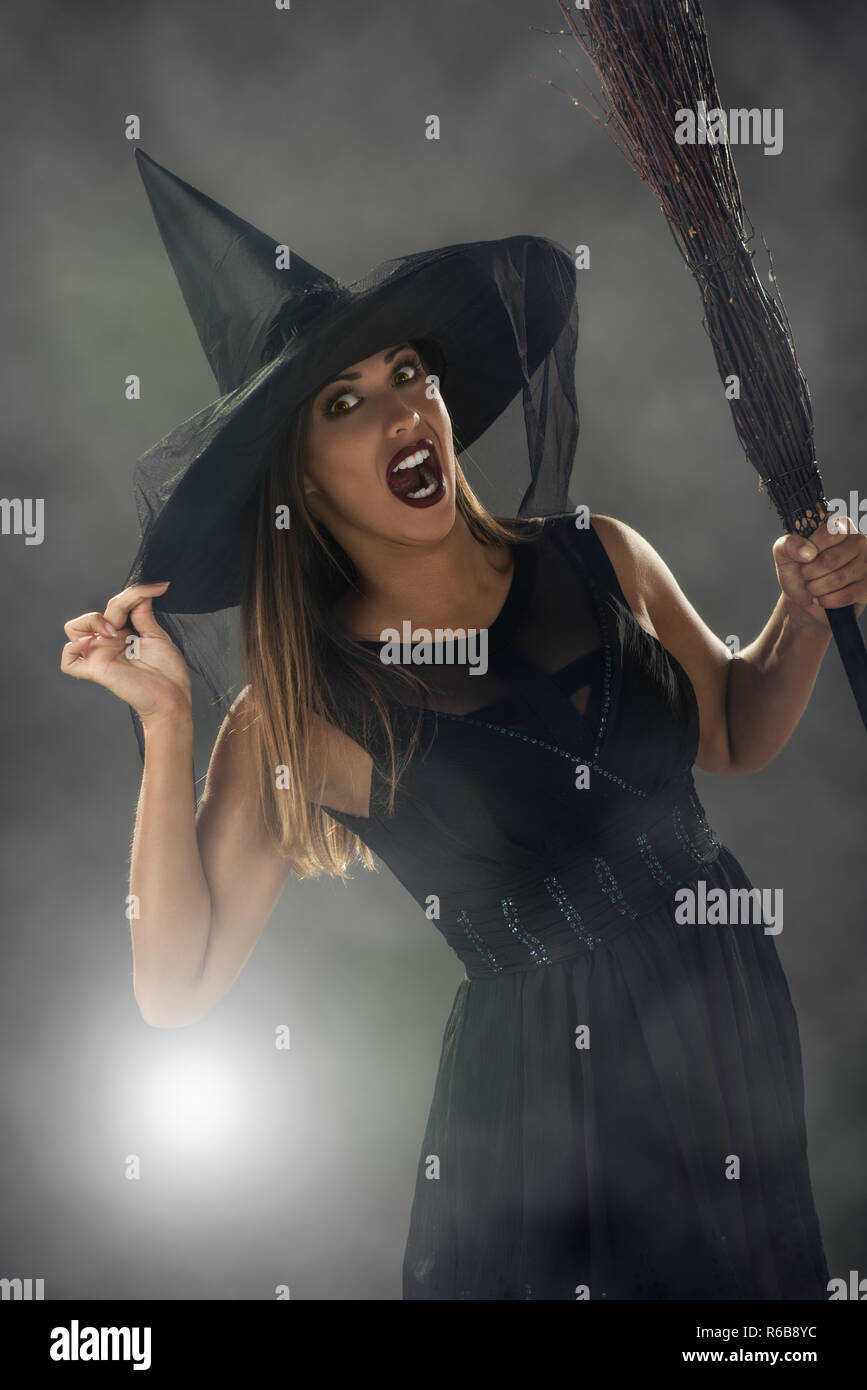 Woman dressed as witch hi-res stock photography and images - Alamy