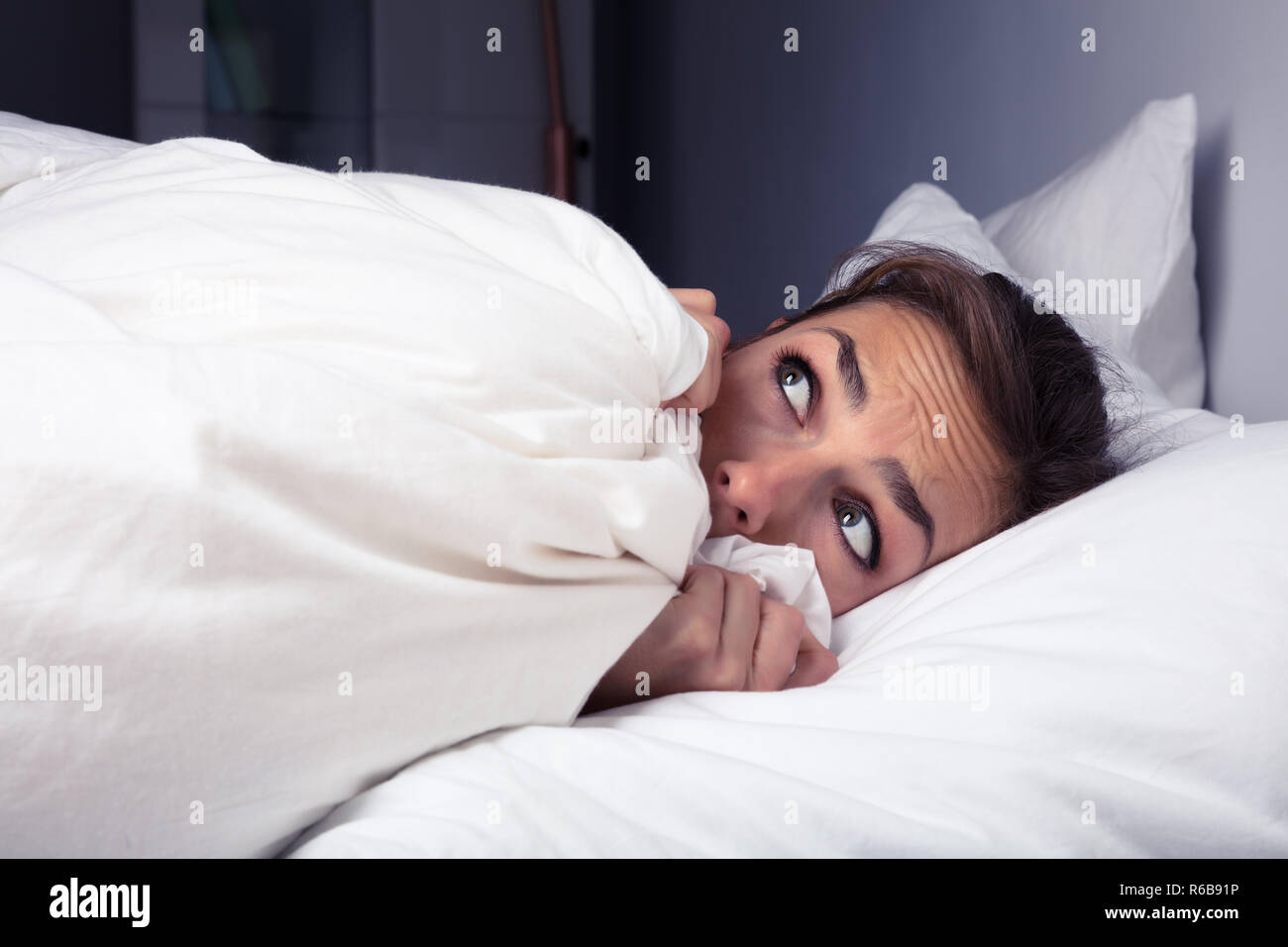 Peeking over bed sheet hi-res stock photography and images - Alamy