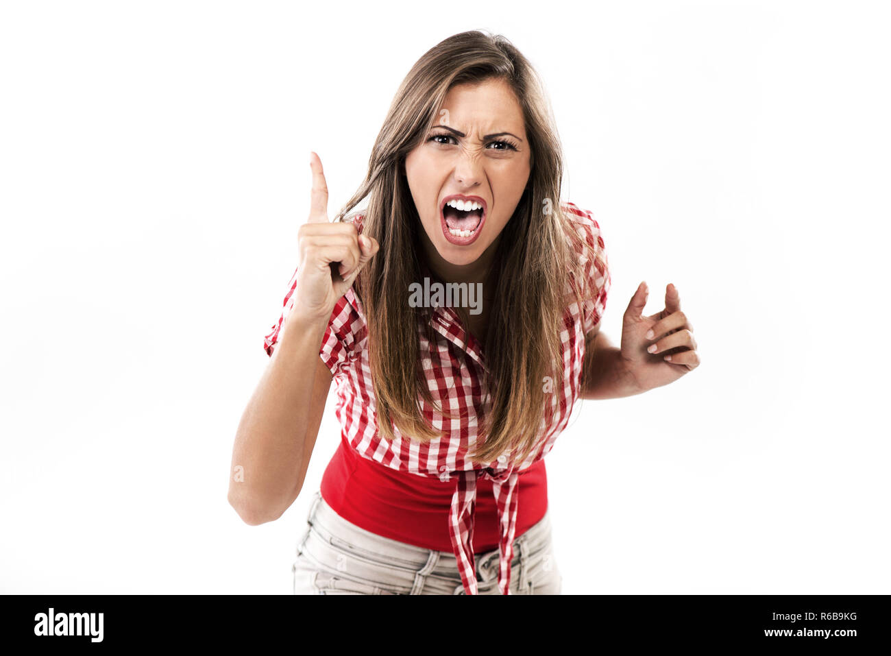 Beautiful young angry woman looking and pointing upset at camera Stock ...