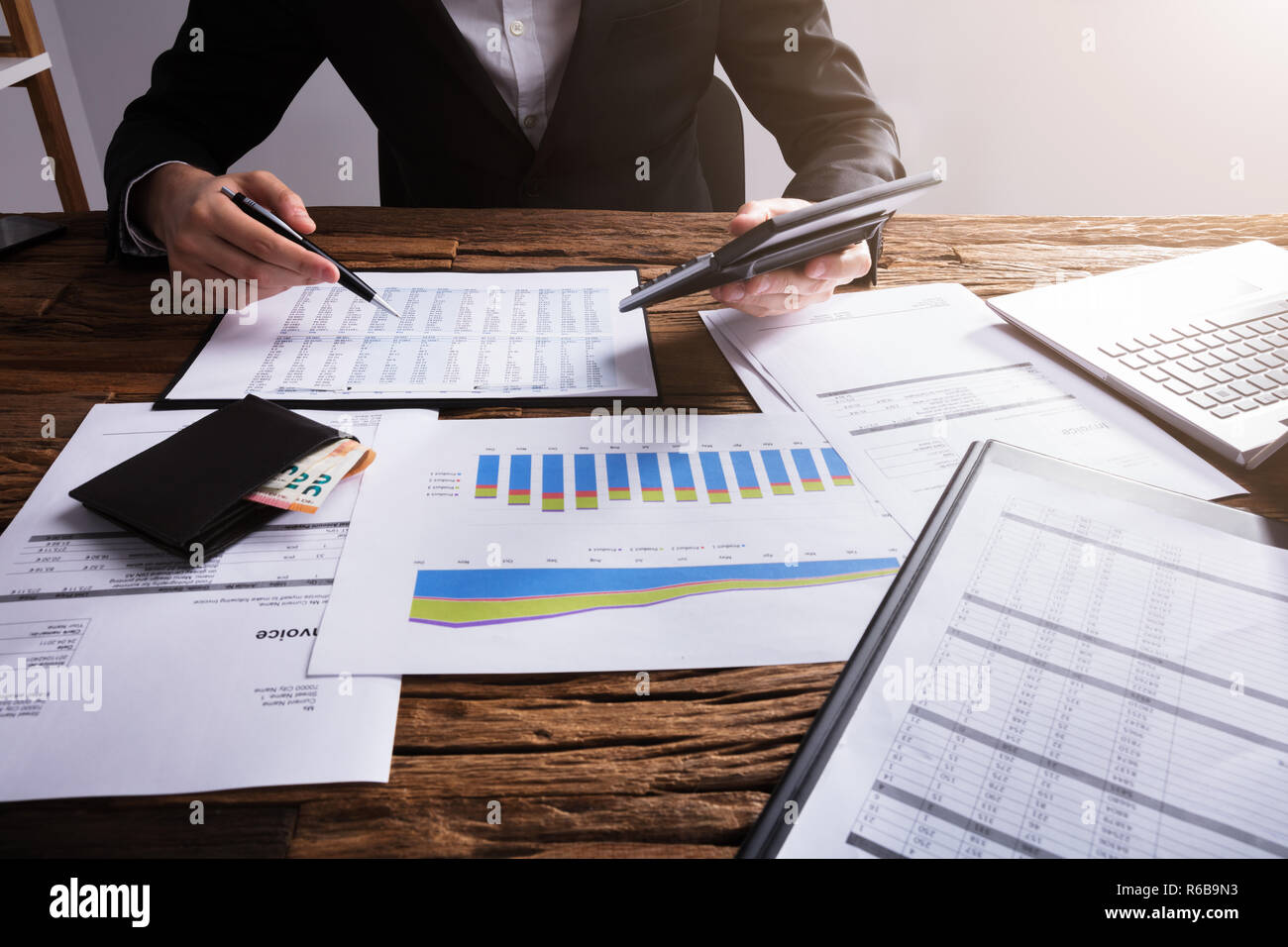 Businessperson Calculating Financial Report Stock Photo - Alamy