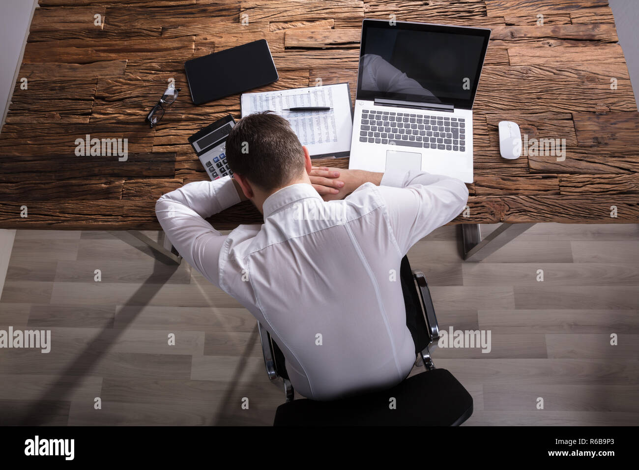 Office workers sleeping at desk hi-res stock photography and images - Alamy