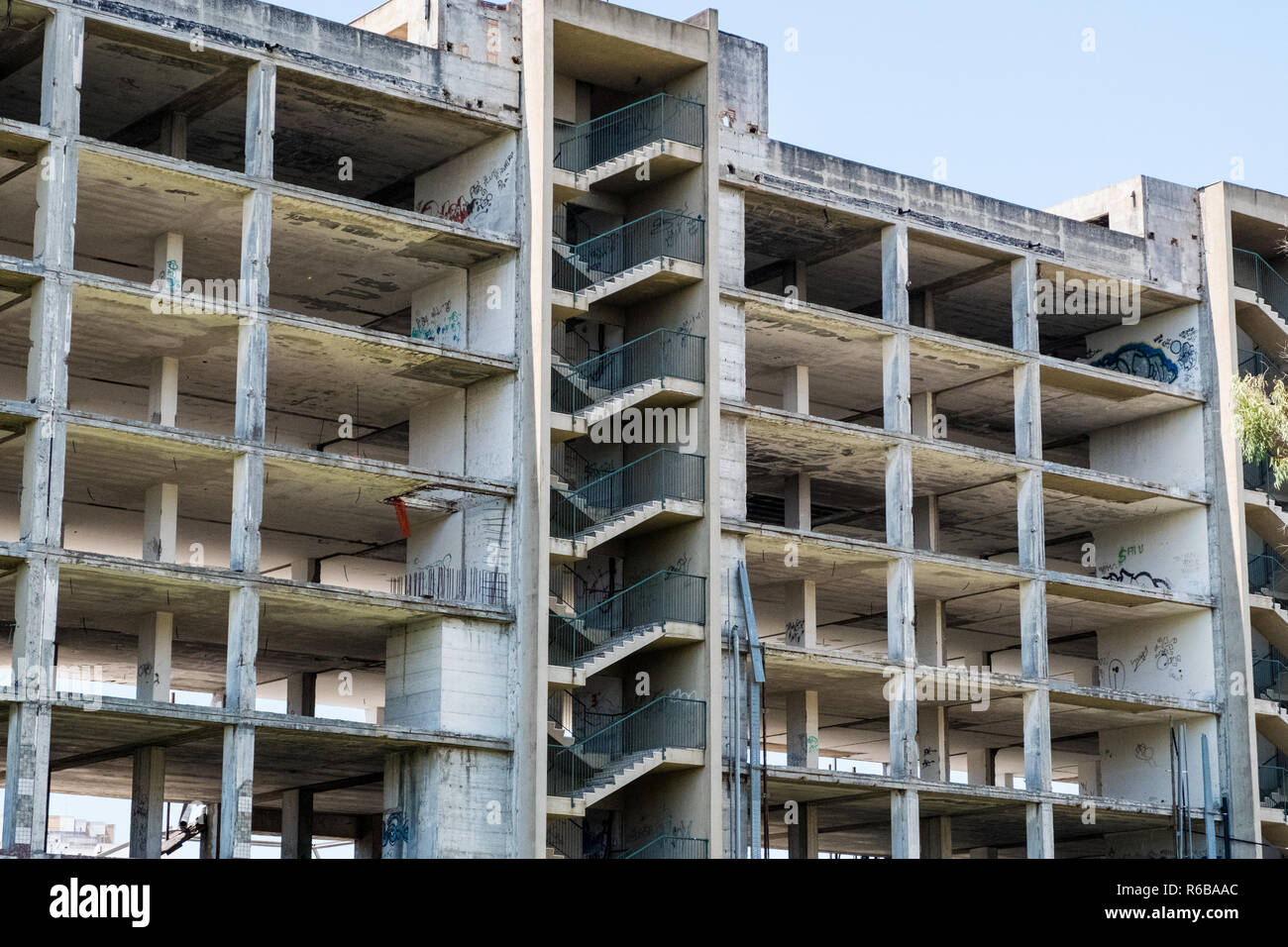 Huge multi floors concrete structure of abandoned building with stairs ...