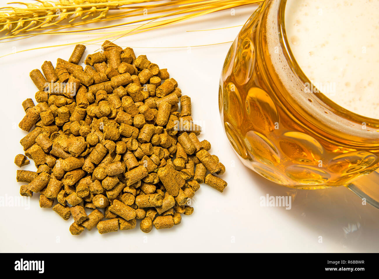 Hops Pellets With Beer Glass Stock Photo - Alamy