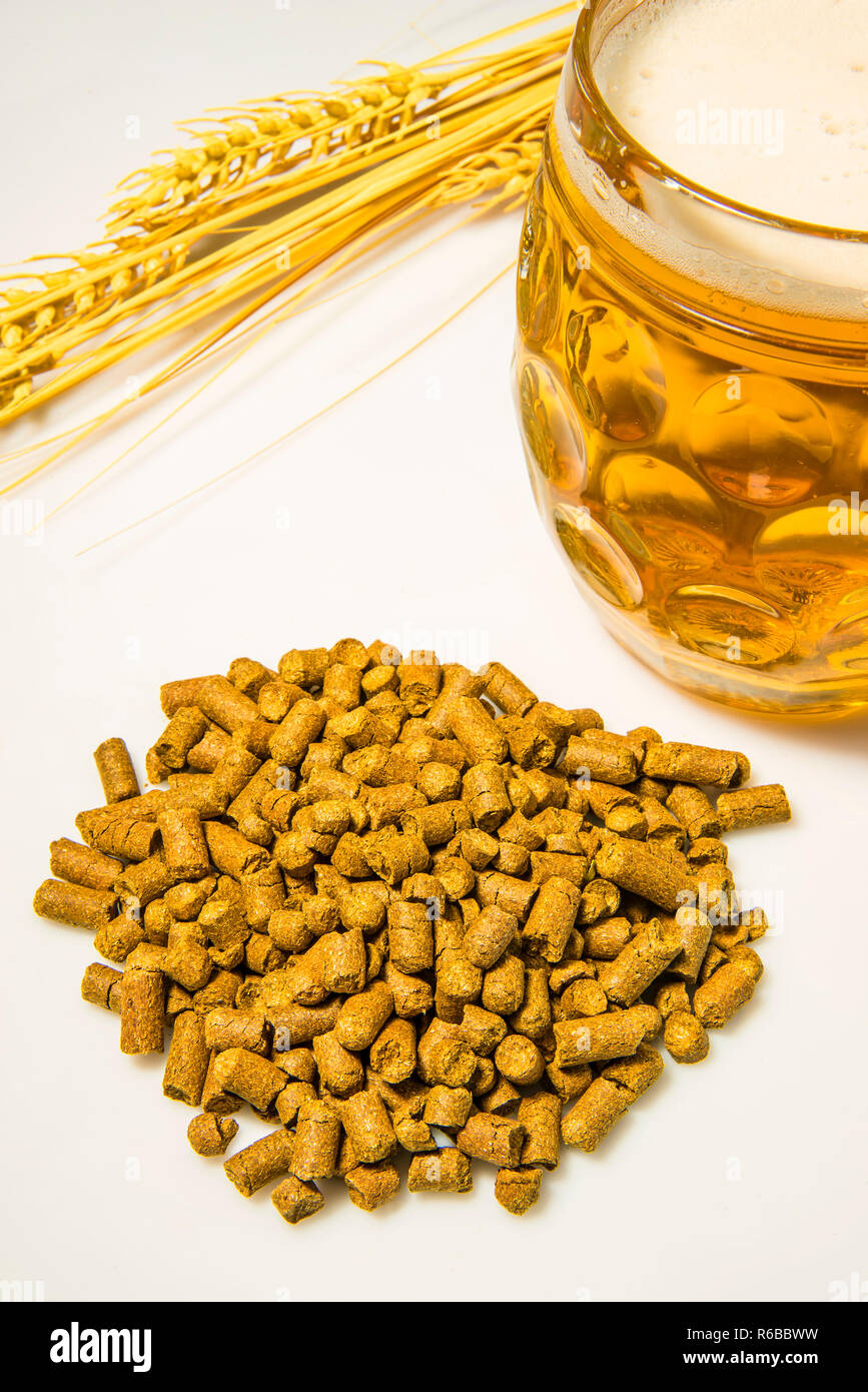 Hops Pellets With Beer Glass Stock Photo - Alamy