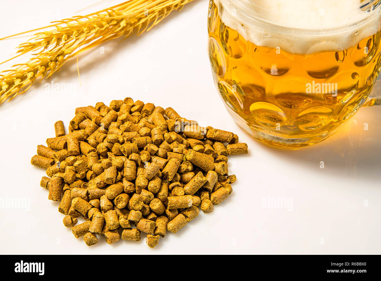 Hops Pellets With Beer Glass Stock Photo - Alamy