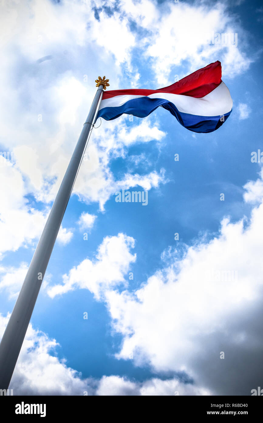 Golden crown on top flag hi-res stock photography and images - Alamy
