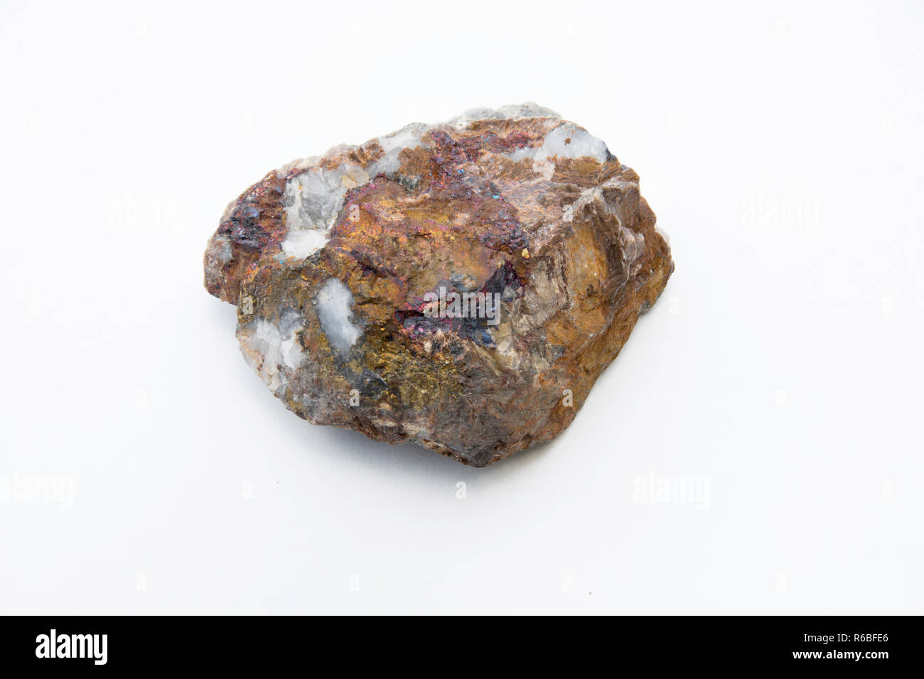 copper iron sulfide mineral isolated over white Stock Photo - Alamy