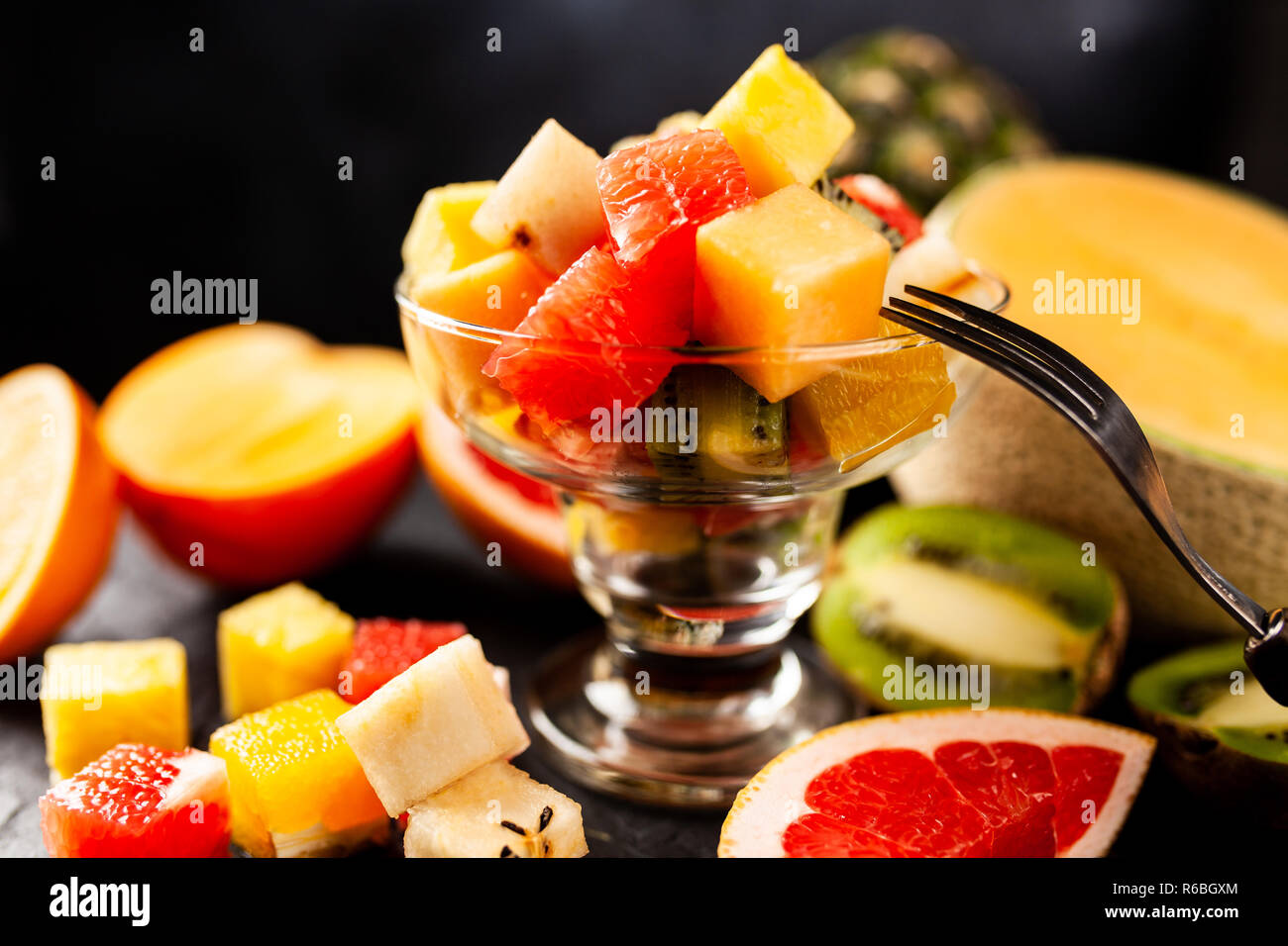 Fruit cube isolated on white background Stock Photo - Alamy