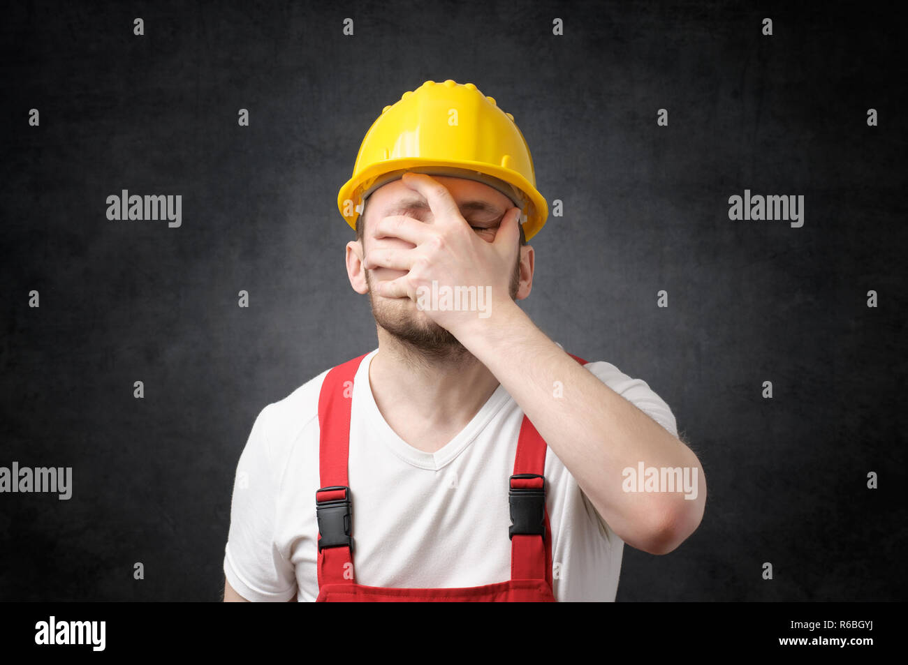 Sad tired construction worker hi-res stock photography and images - Alamy