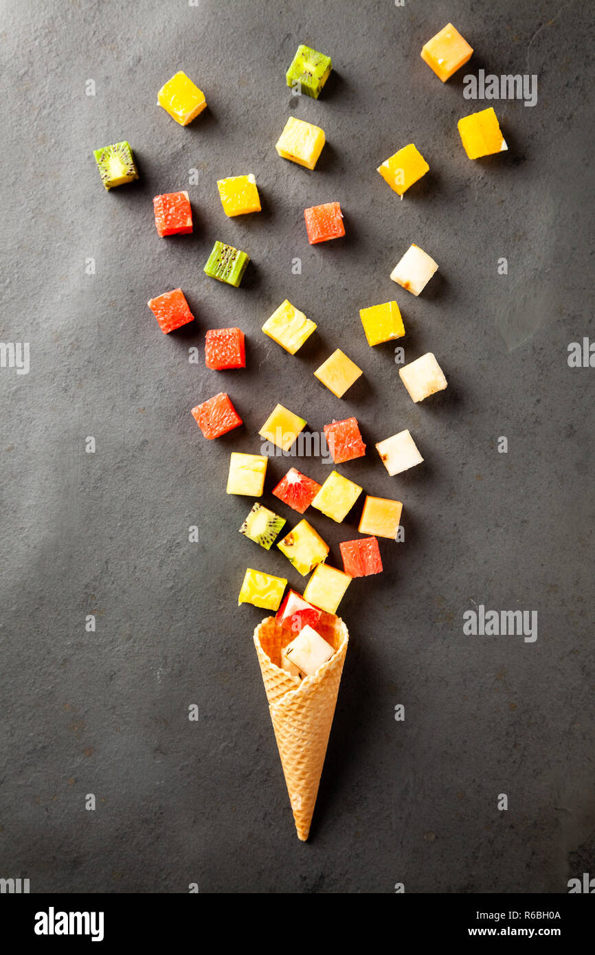 Fruit cube isolated on white background Stock Photo - Alamy