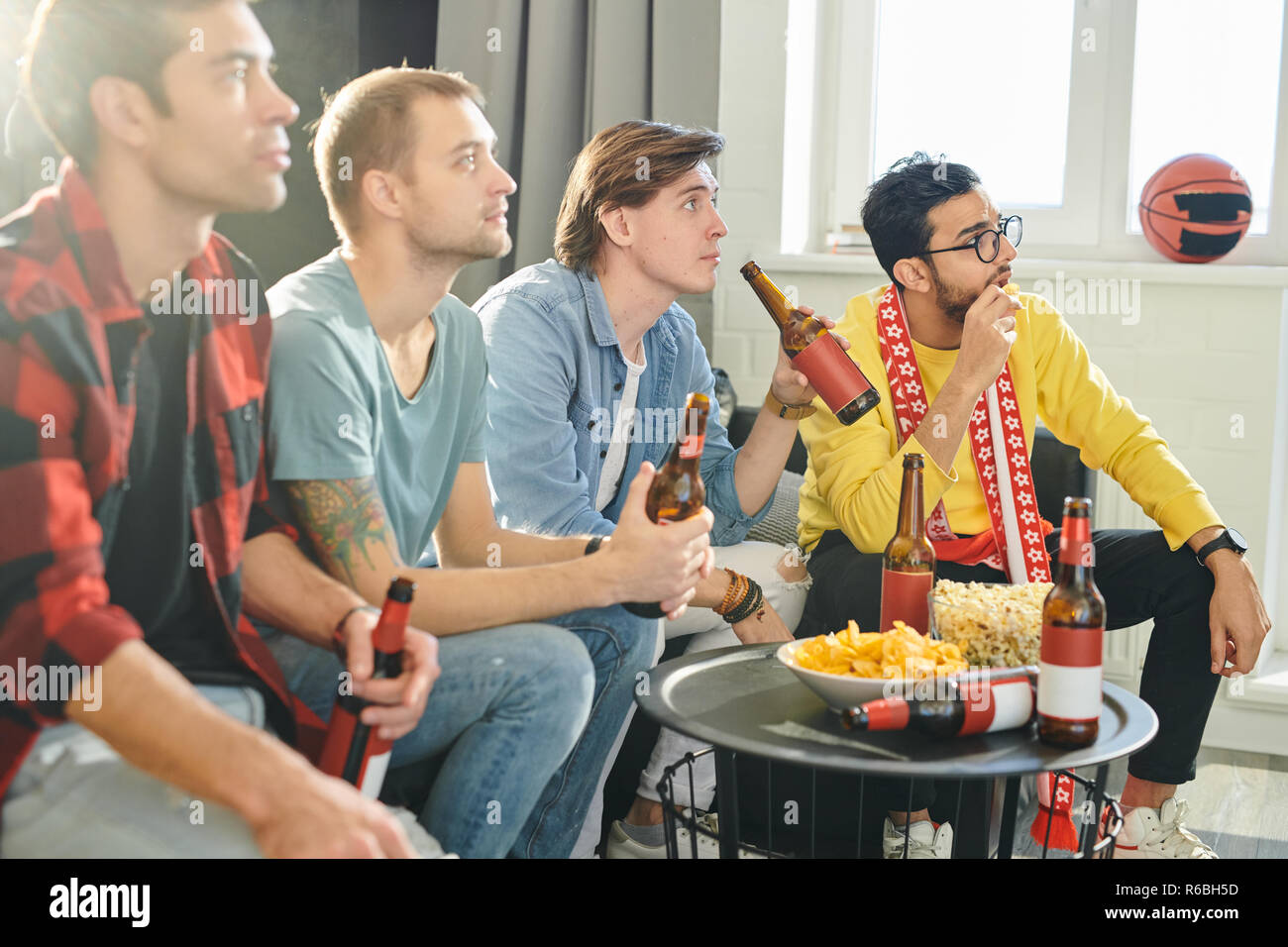 Friends resting at home Stock Photo - Alamy