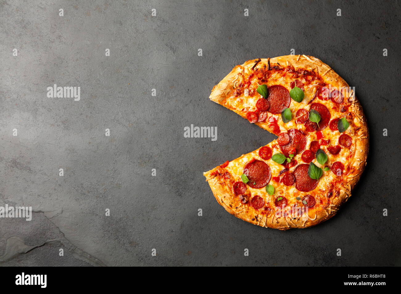 Pizza with salami and chorizo topping Stock Photo - Alamy