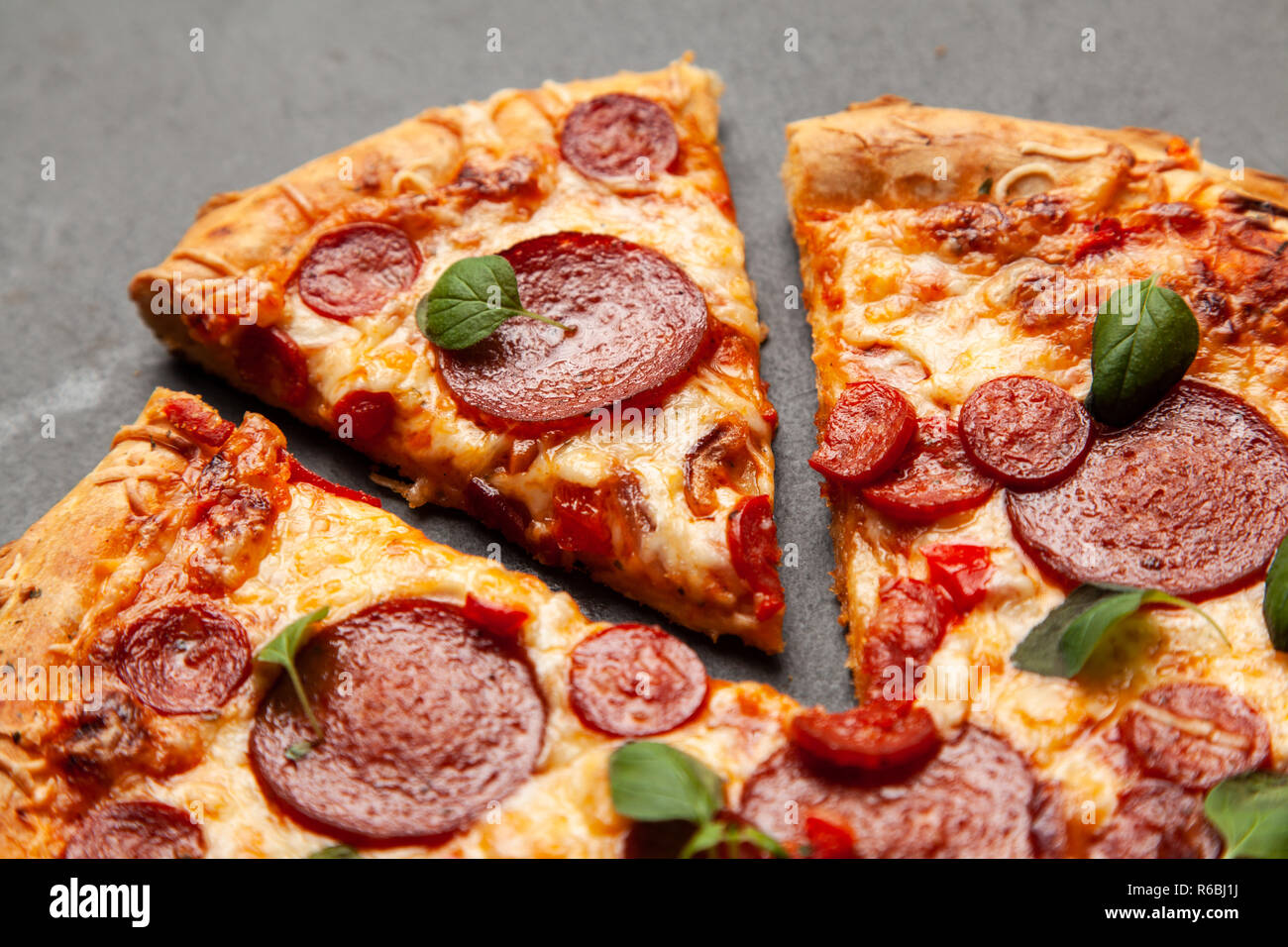 Pizza with salami and chorizo topping Stock Photo - Alamy