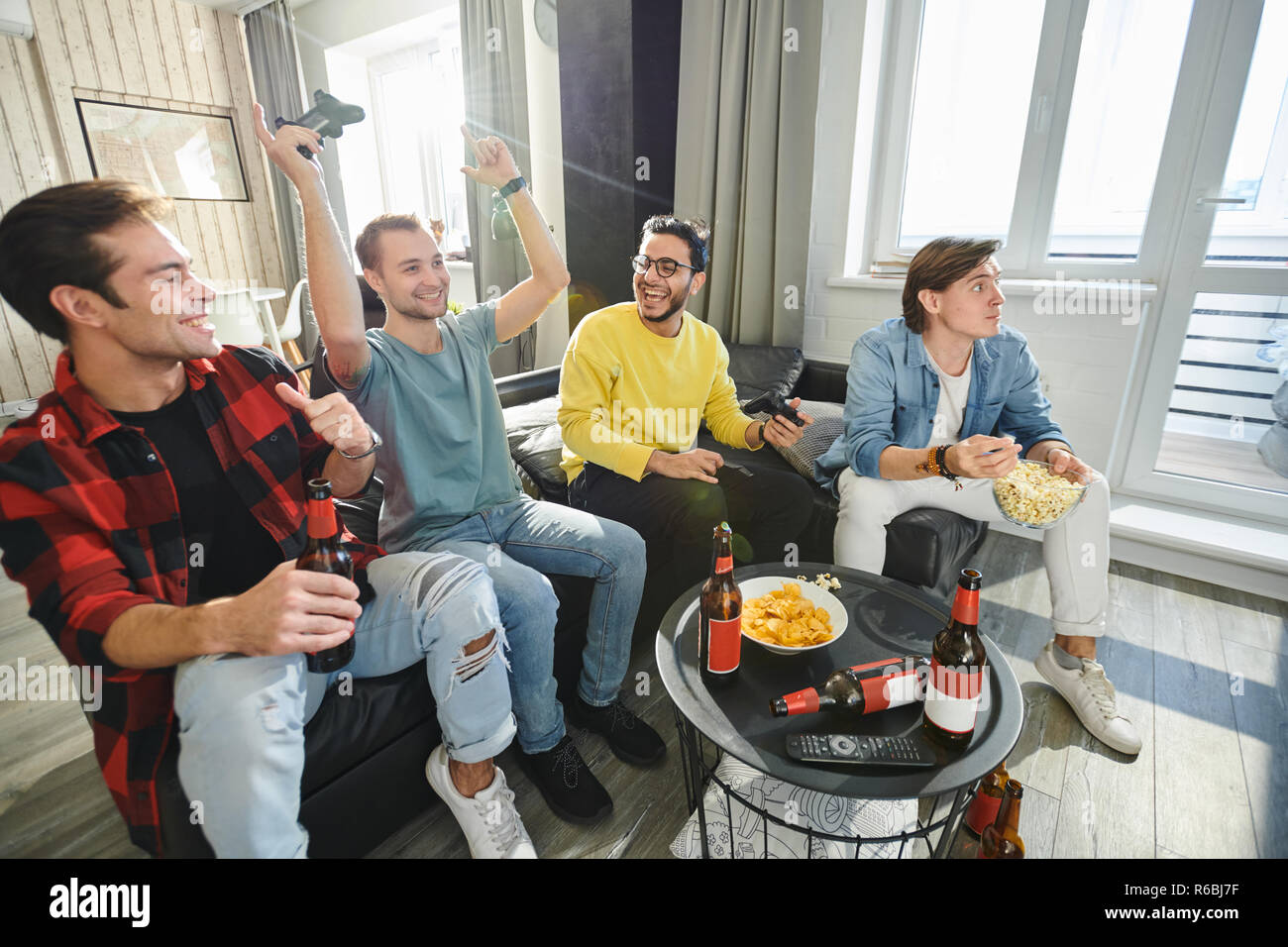 Happy winner in the game Stock Photo - Alamy