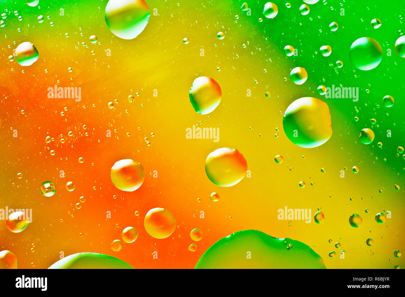Oil-Drops Floating In Water Stock Photo - Alamy