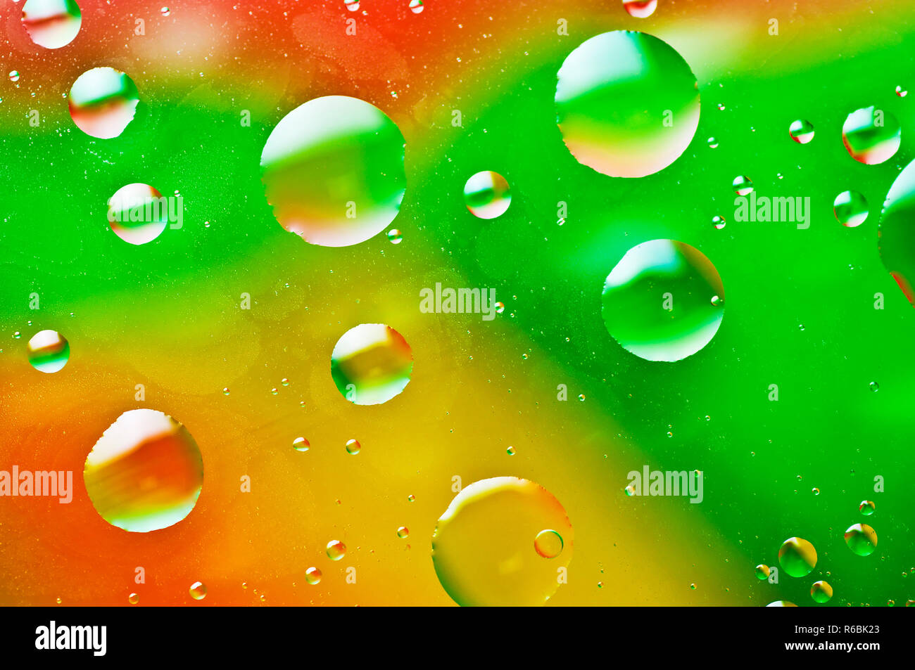 Oil-Drops Floating In Water Stock Photo - Alamy