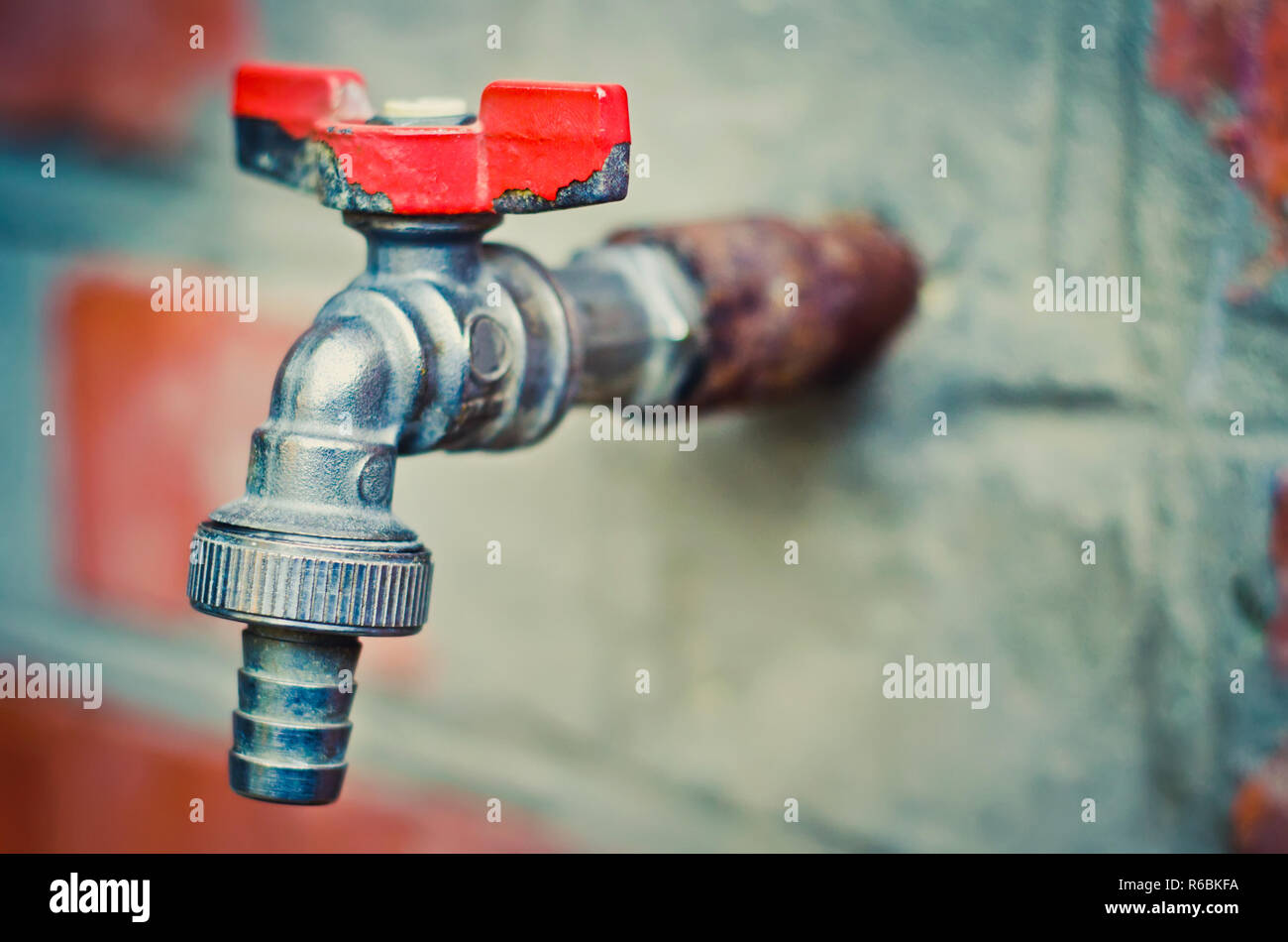 Old faucet in wall hi-res stock photography and images - Alamy